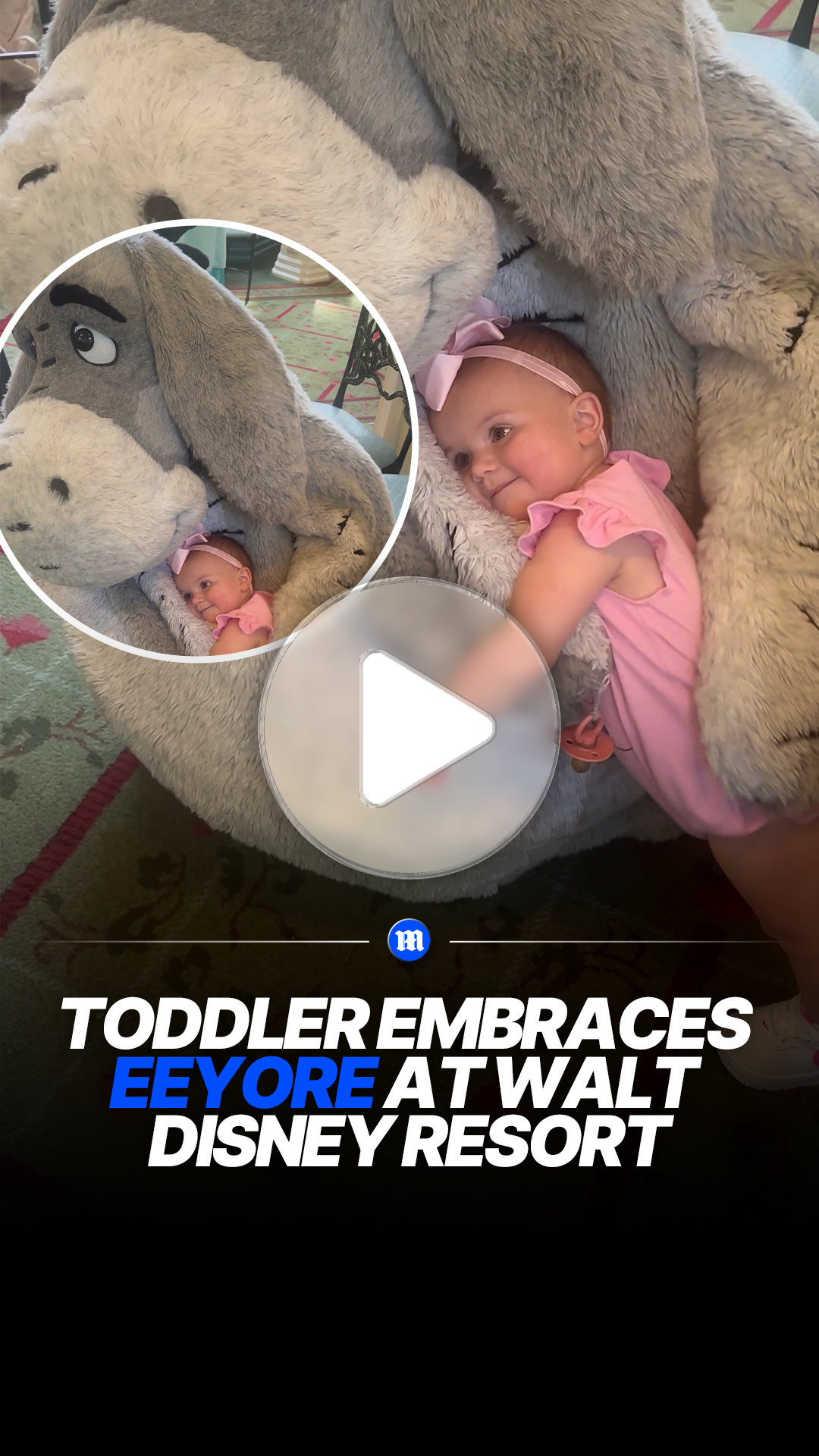 Toddler shares sweet hug with Eeyore at Disney World