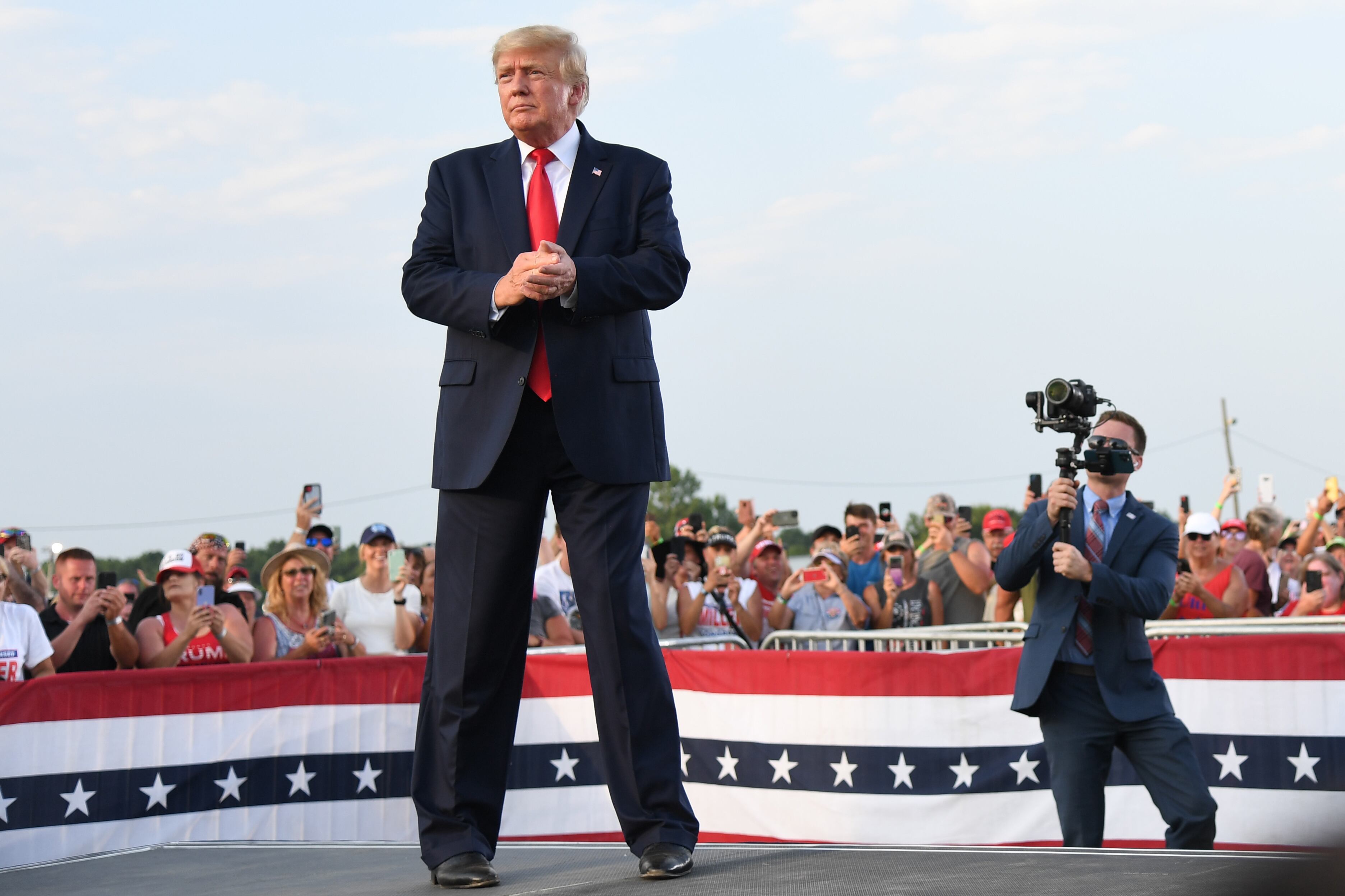 Trump accused of showing off classified map on flight to his golf club