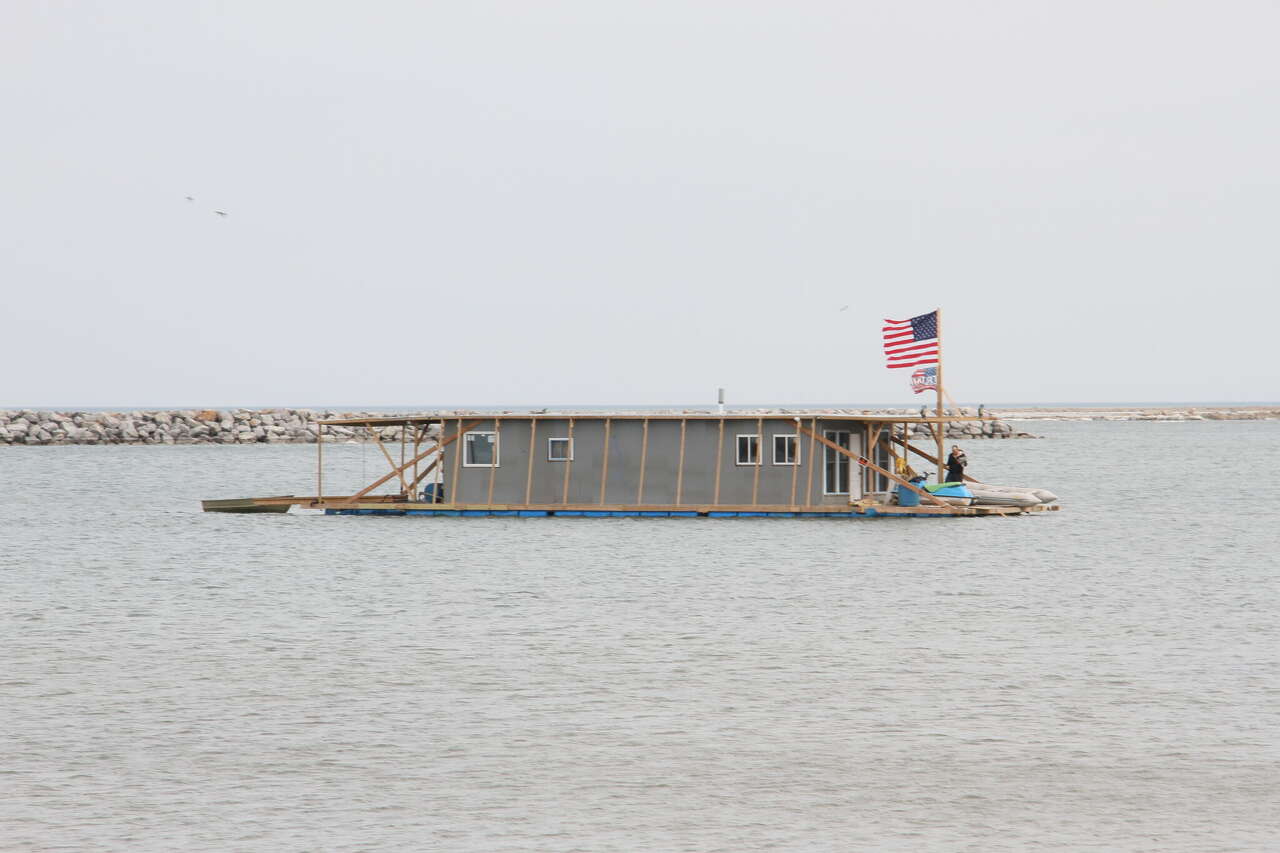 Neverlanding houseboat seen leaving Port Austin after months at dock