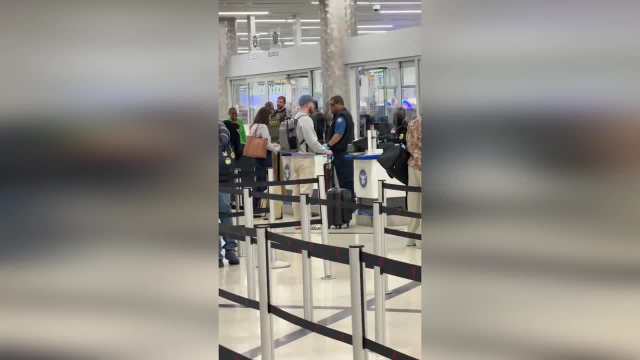 Long lines form as ICE agents monitor security at Atlanta Airport