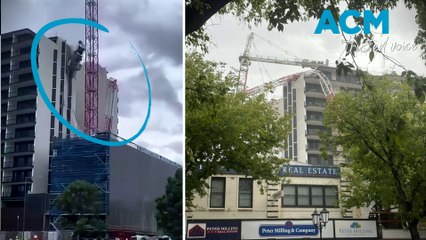 Tower crane collapses onto Dubbo high-rise during wild storm