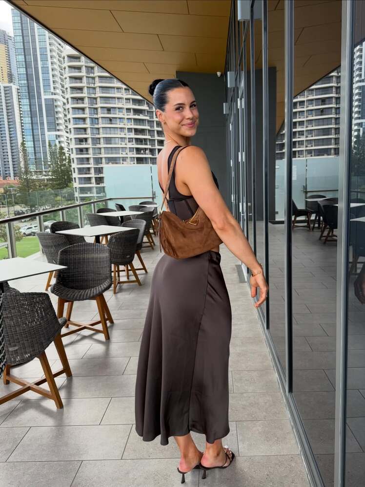 Australian Olympic bobsledder Desi Johnson nails wedding guest chic in ...