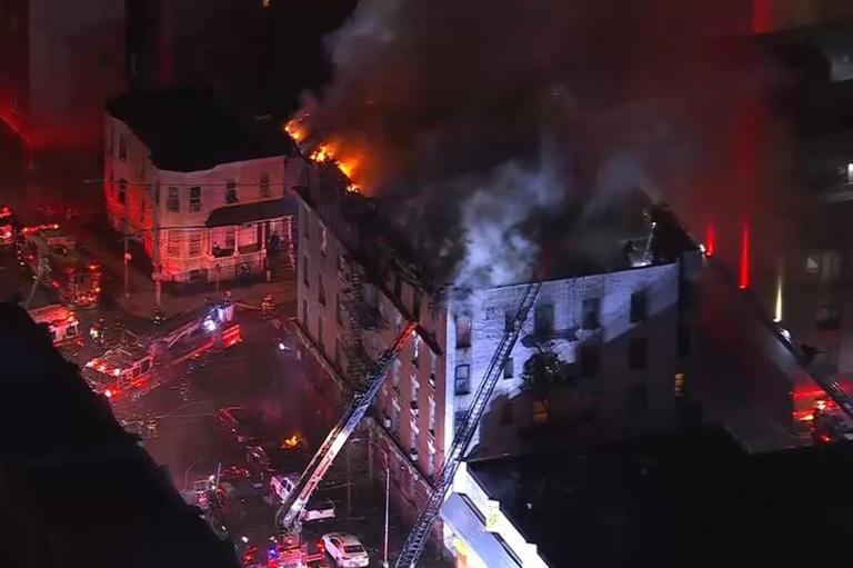 Bronx apartment fire engulfs building as horror images show flames rip ...