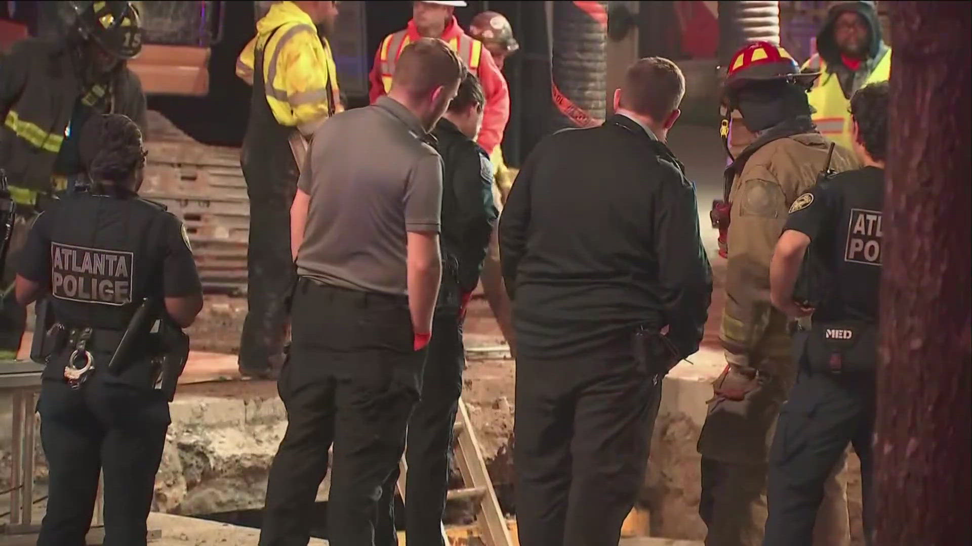 Emergency crews rescue worker who fell into hole in downtown Atlanta