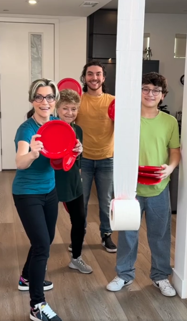 Hanging toilet paper game that gets everyone laughing