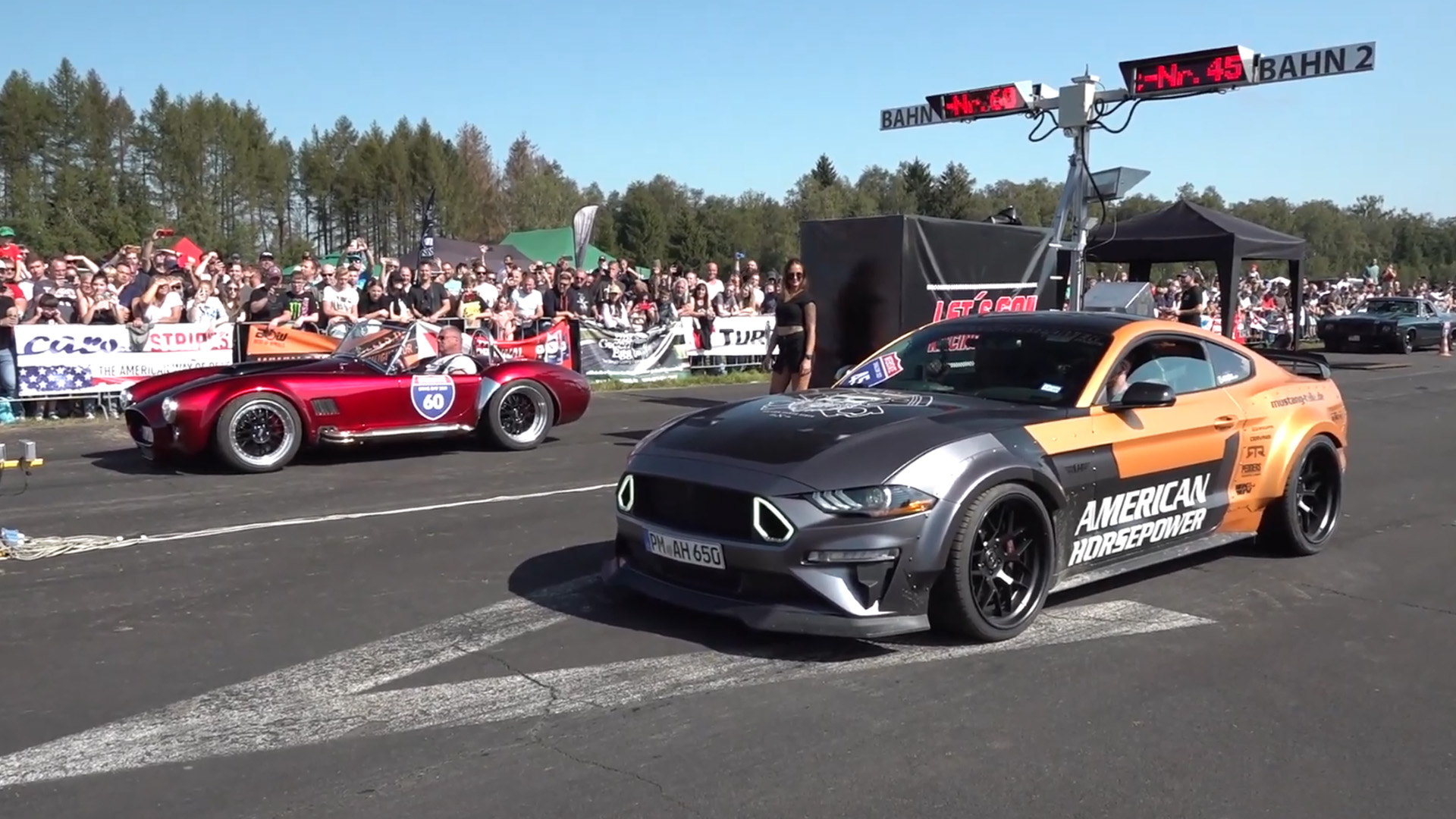 Ford Mustang GT takes on AC Cobra in drag race competition
