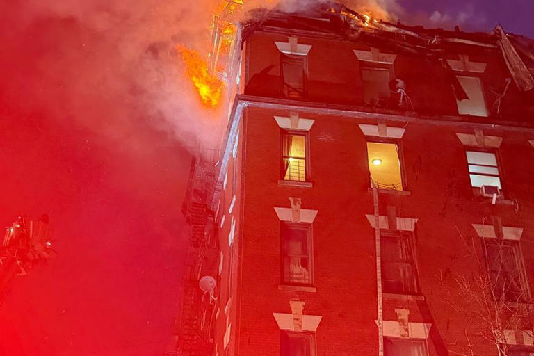 Bronx apartment fire engulfs building as horror images show flames rip ...