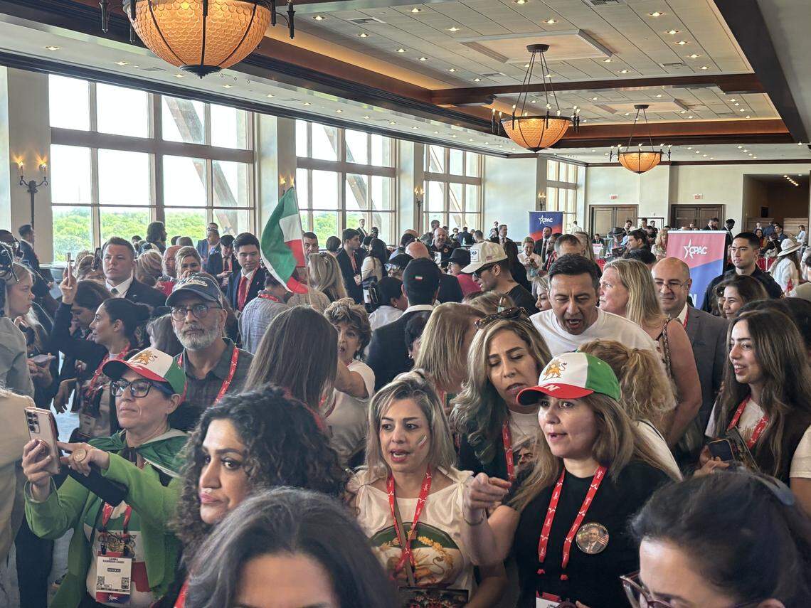 Hundreds of Iranian war demonstrators rally near CPAC 2026 to thank Trump