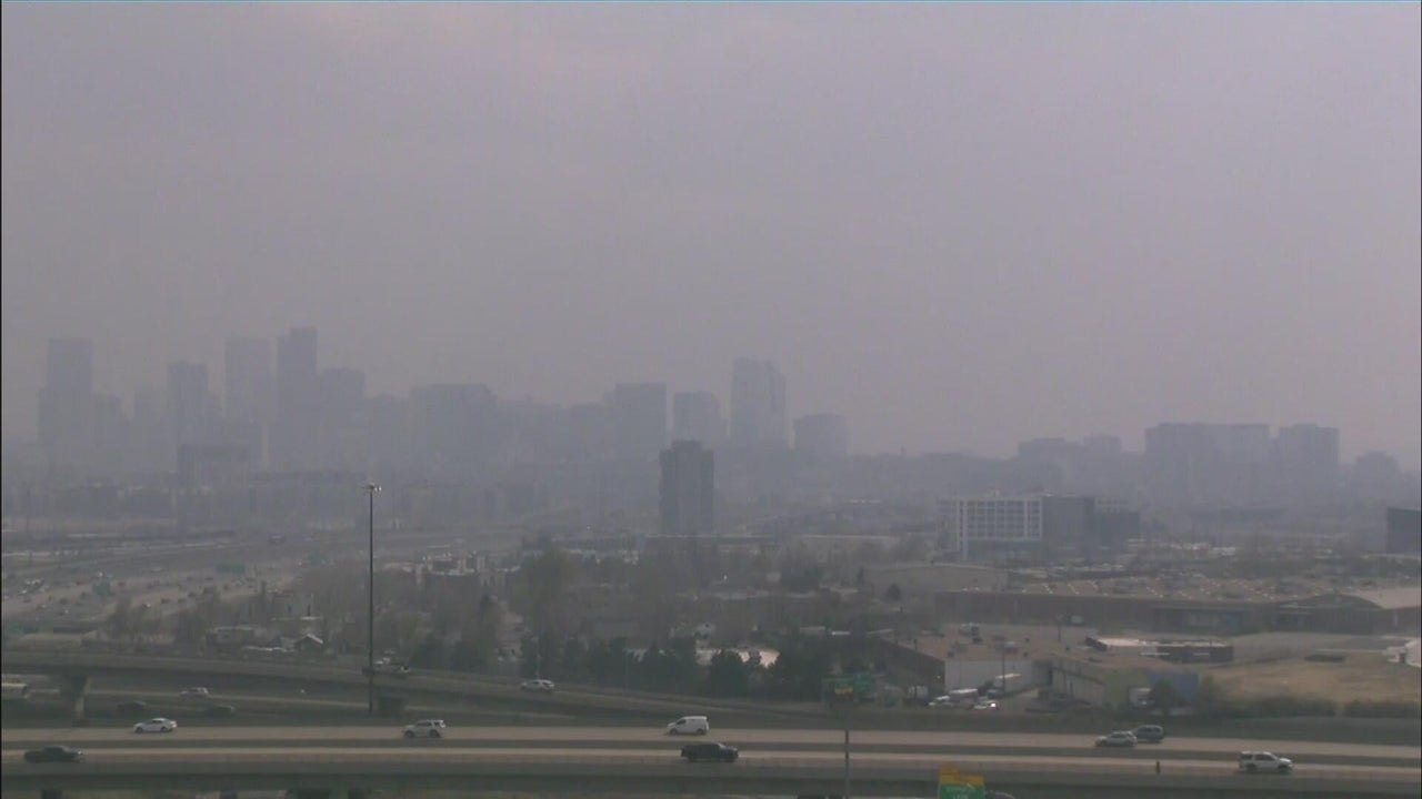 Skies become hazy as cold front moves through in Denver, wildfire smoke ...