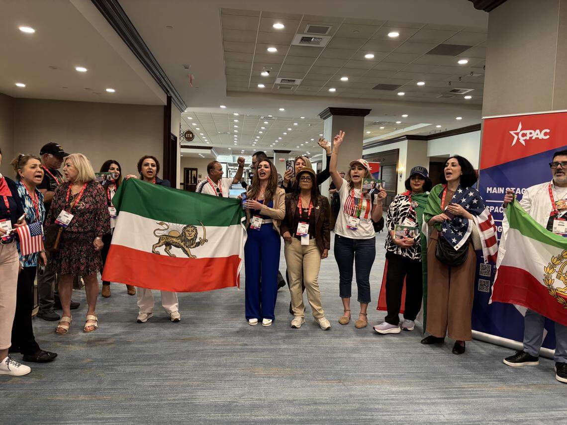 Hundreds of Iranian war demonstrators rally near CPAC 2026 to thank Trump