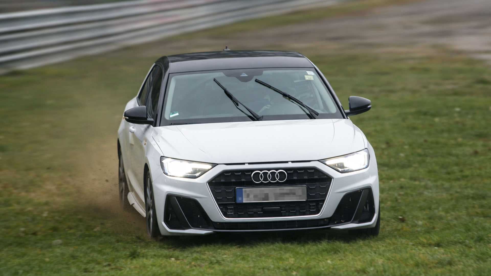 Changing track conditions shift car beyond racing line