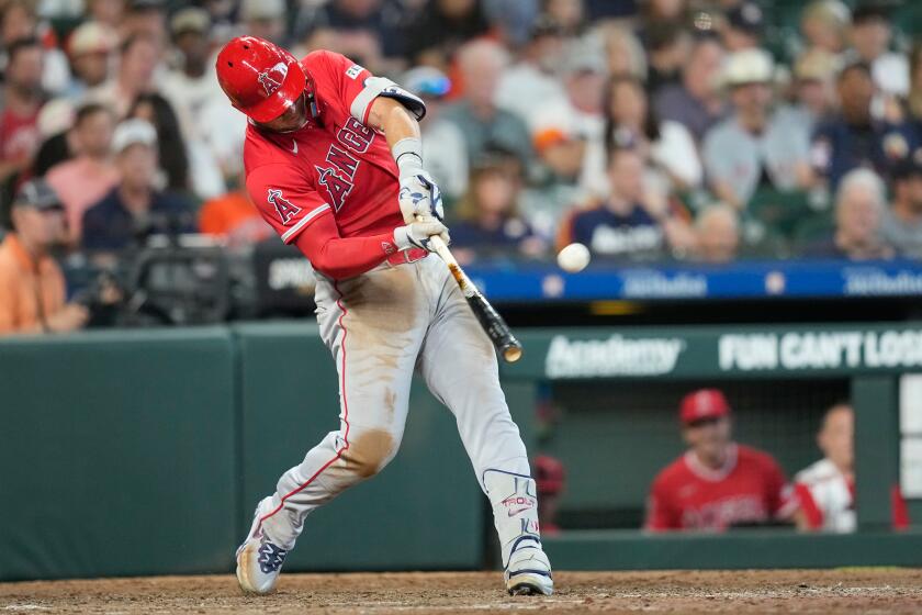 Mike Trout homers to power Angels to season-opening win over Astros