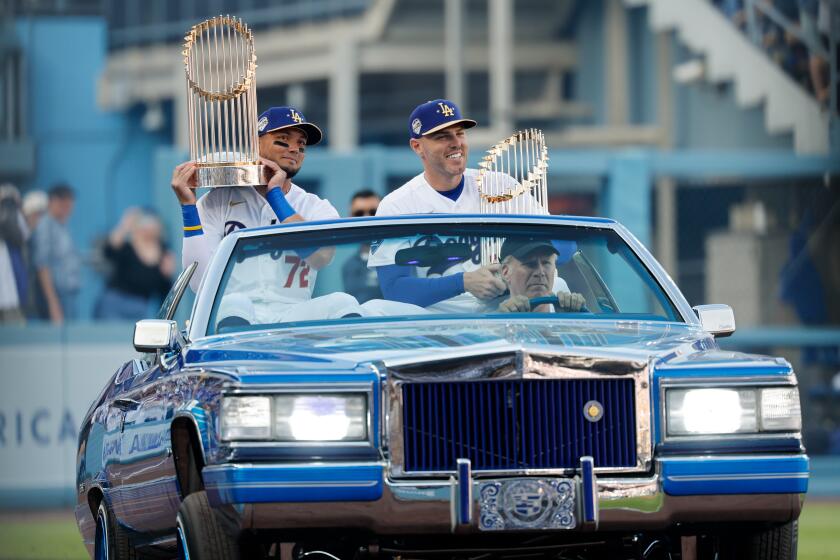 Plaschke: Seeing double: Dodgers celebrate titles on a sparkling ...