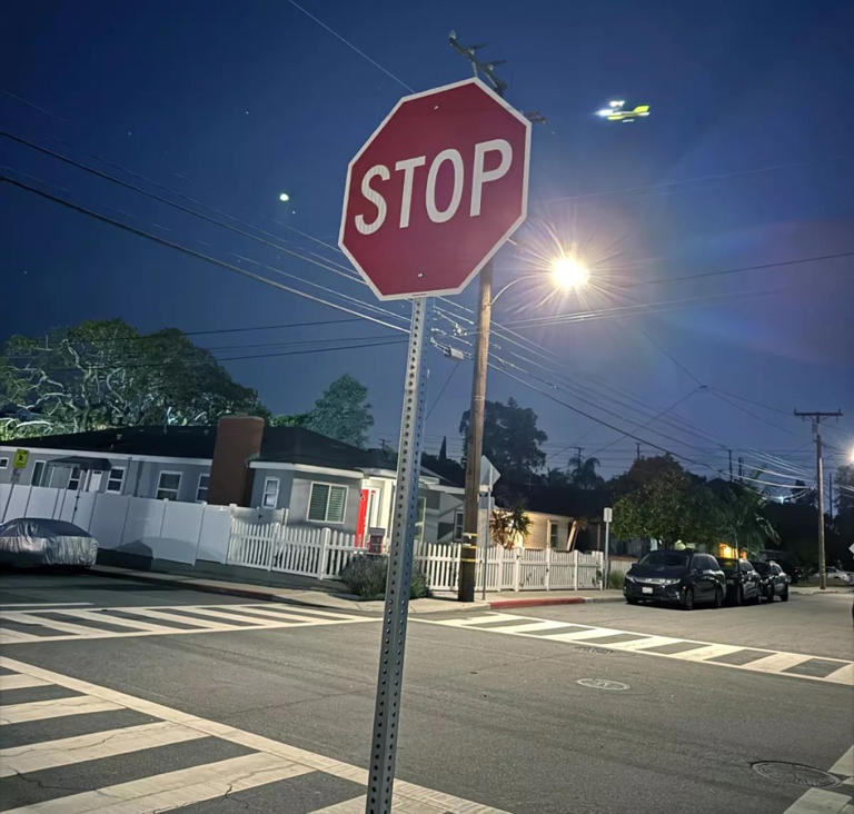 California dad arrested for repainting, adding stop signs at dangerous ...