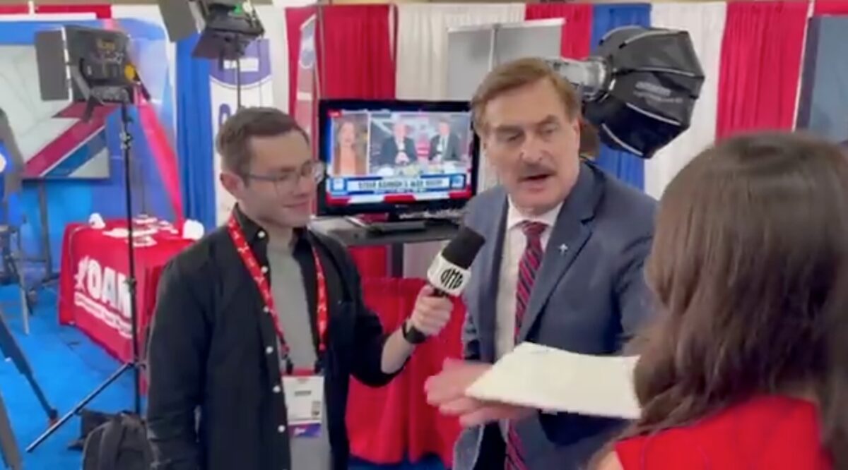 MyPillow guy Mike Lindell appears to be served lawsuit during live CPAC ...