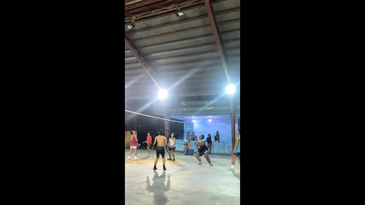 Volleyball gets stuck on covered court roof during game in Calapan ...
