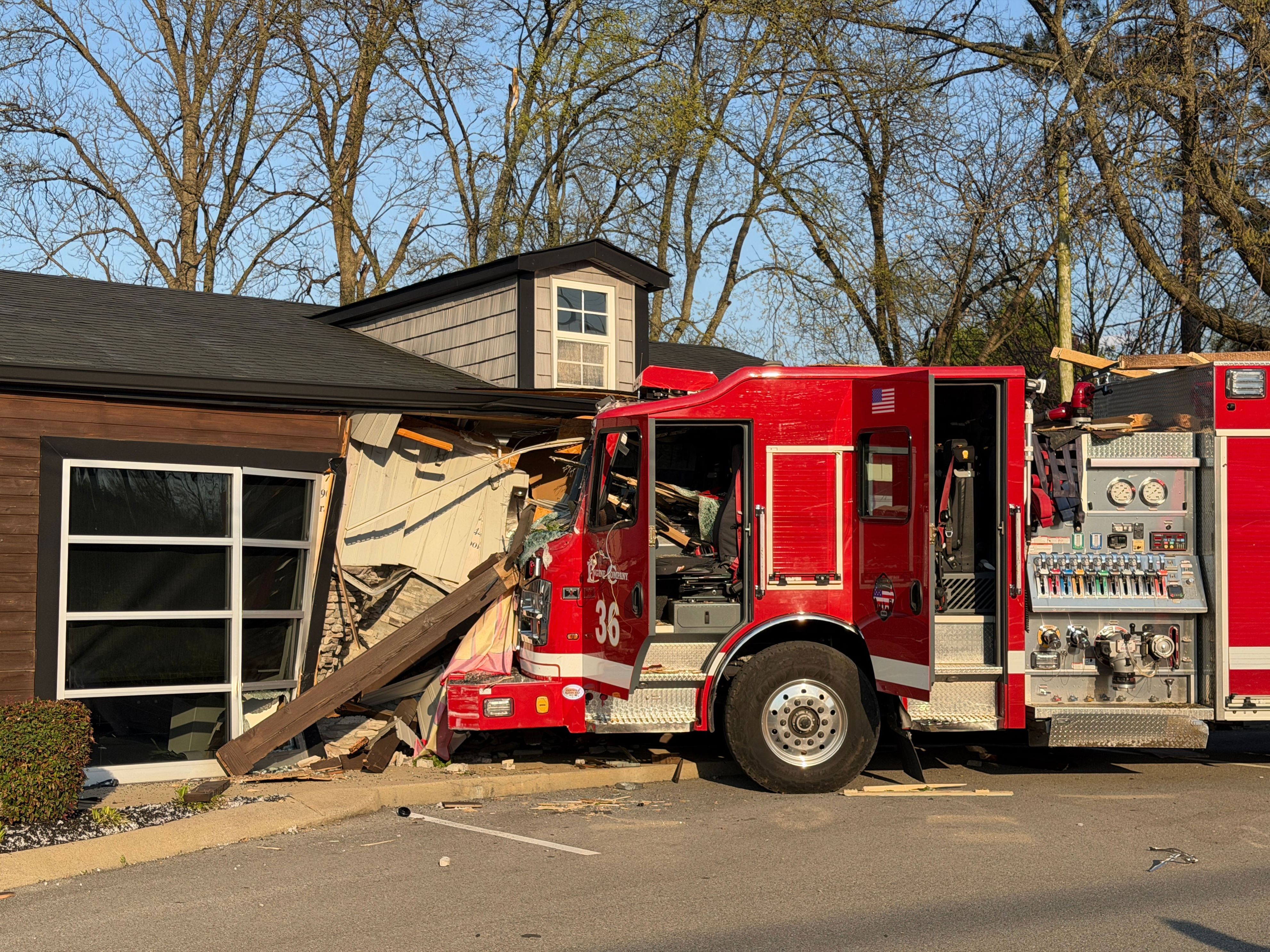 Firefighter hospitalized after crashing fire engine into telephone ...