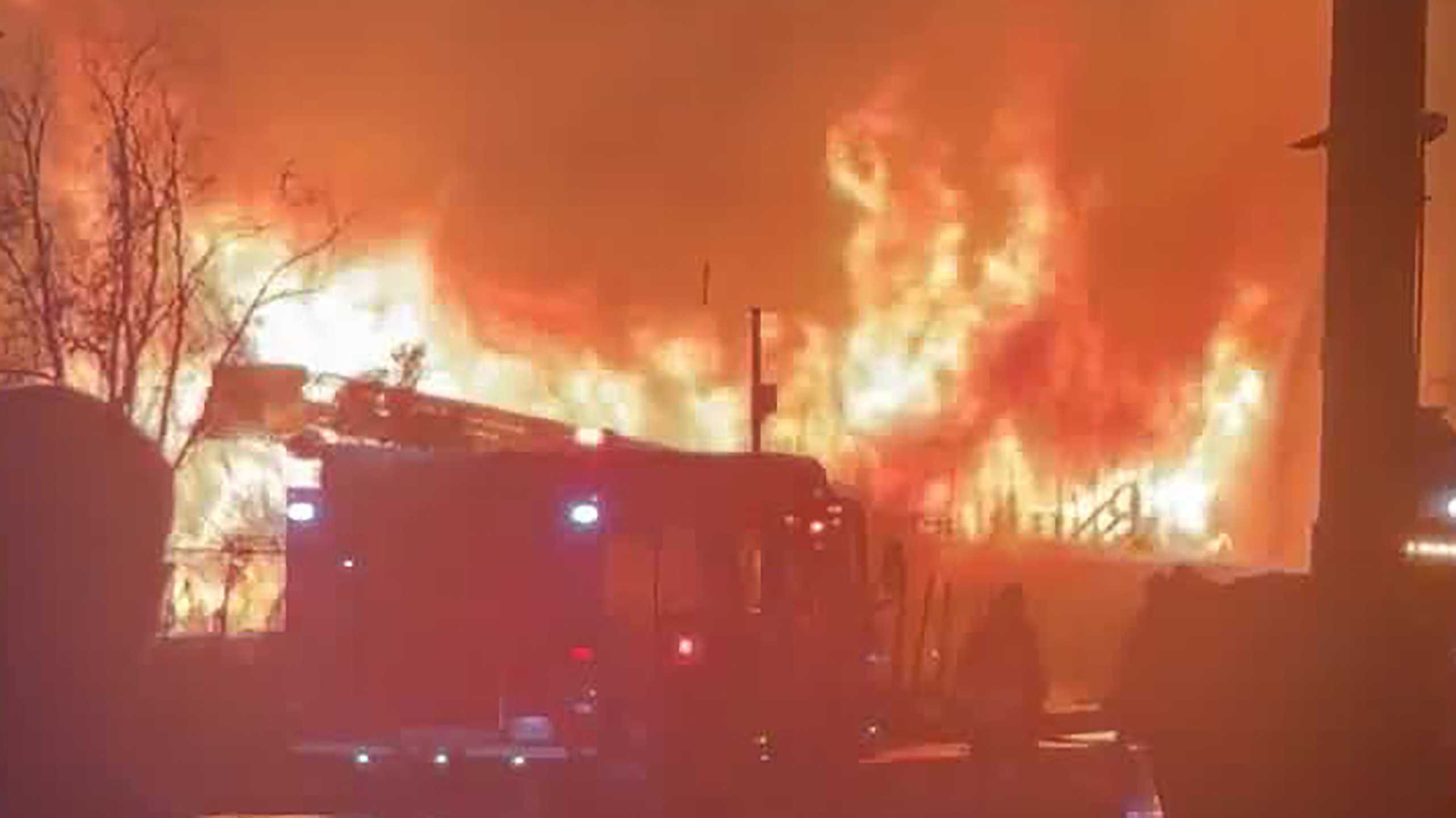 Wind shift fueled fire that burned through building, JFD ladder truck