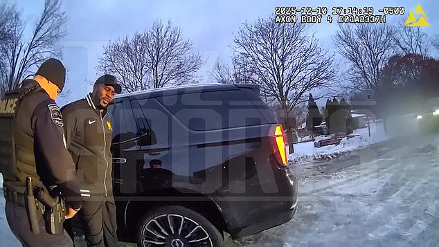 Bodycam footage shows ex-Michigan coach in tears during arrest
