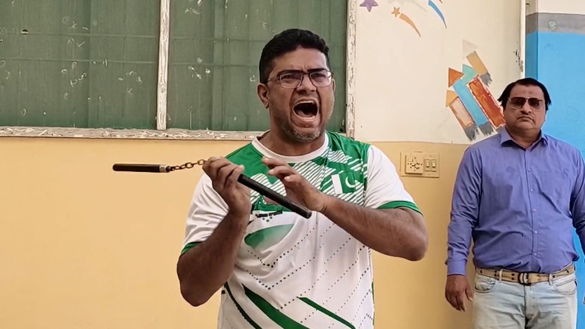 Muhammad Rashid Most Nunchaku Behind-the-Neck Passes in One Minute