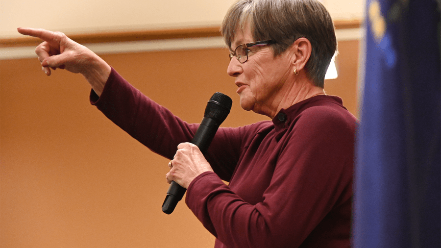 Kansas gov. vetoes bill requiring high school students pass an American ...