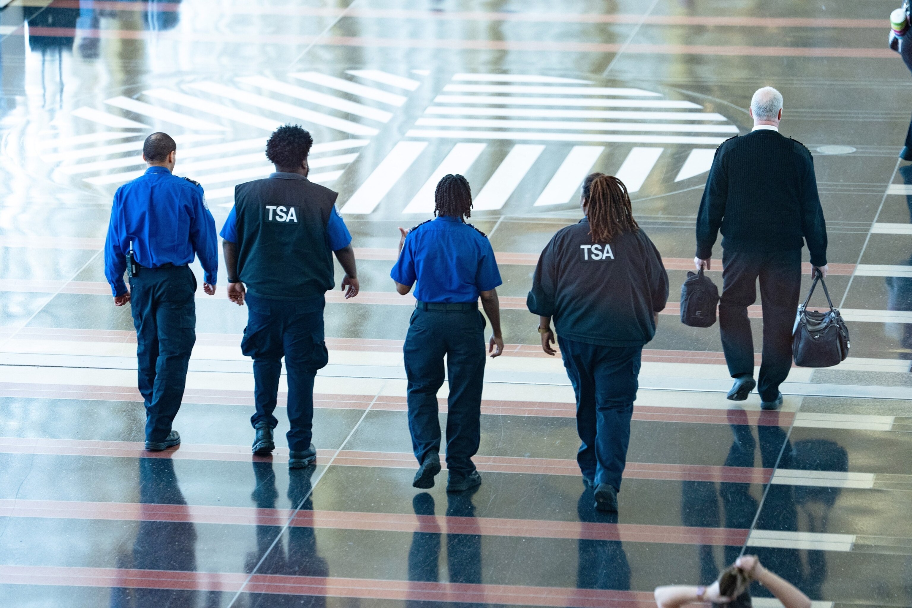 TSA officers working without pay should expect checks on Monday: DHS