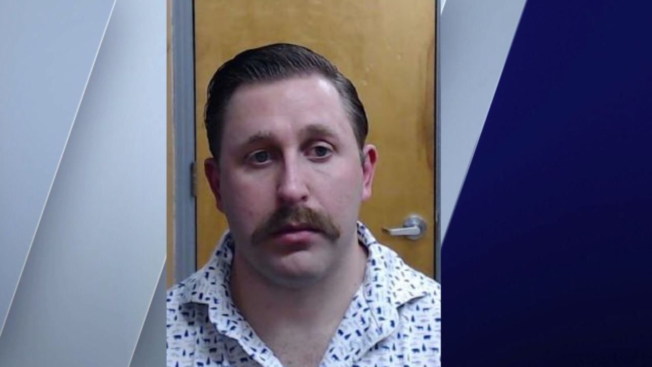 Political operative found not guilty in "threatening texts" case