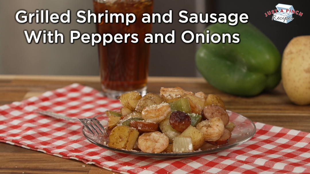 Grilled shrimp and sausage with peppers and onions