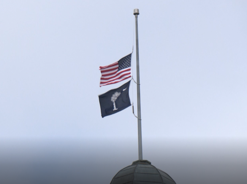 Why are flags flying at half-staff in South Carolina on Thursday?