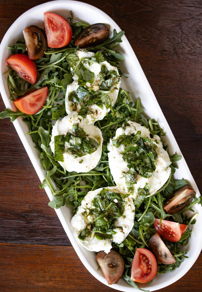Buffalo Mozzarella Marinated With Tomato And Arugula