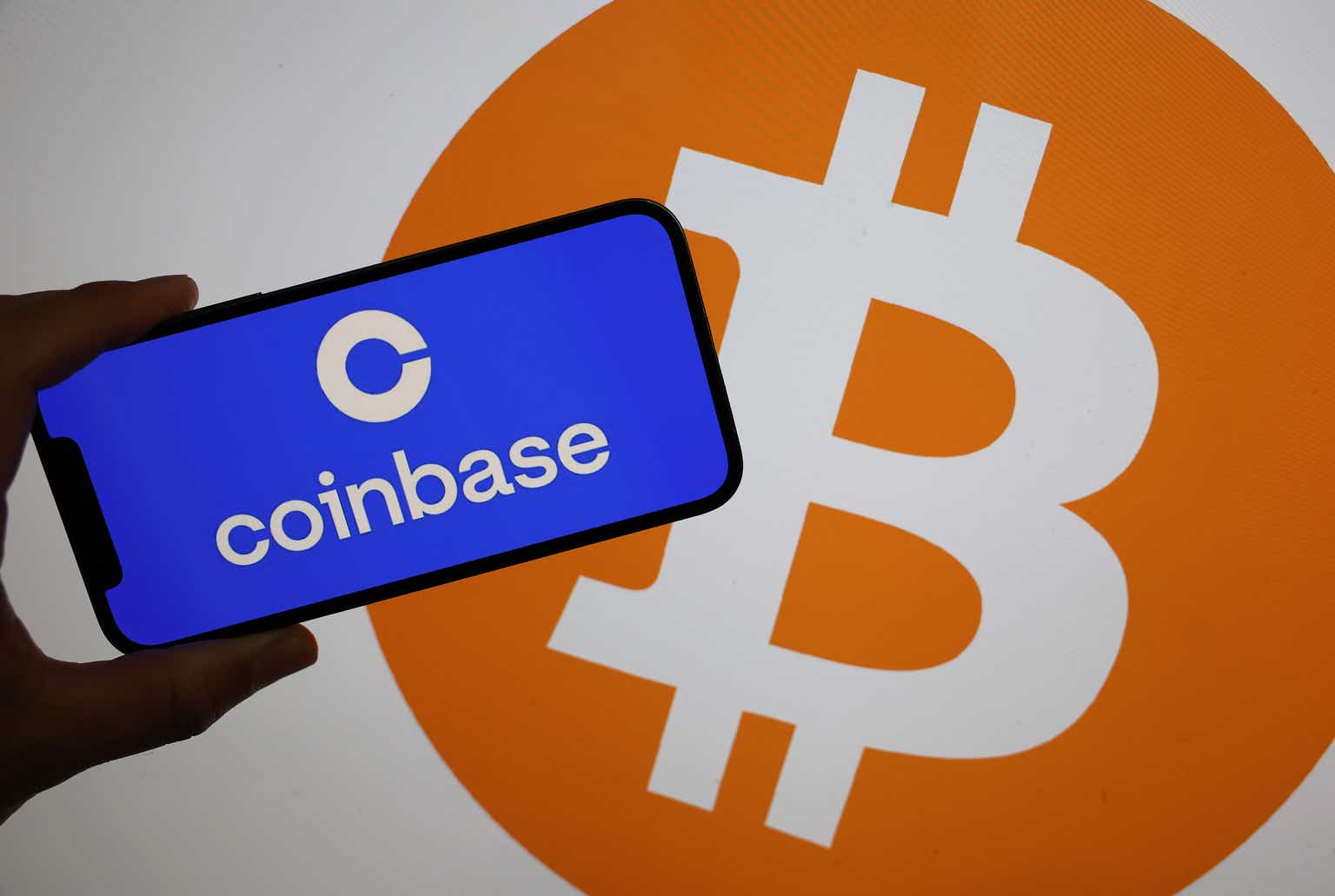 Coinbase stock gains after SEC poised to dismiss suit