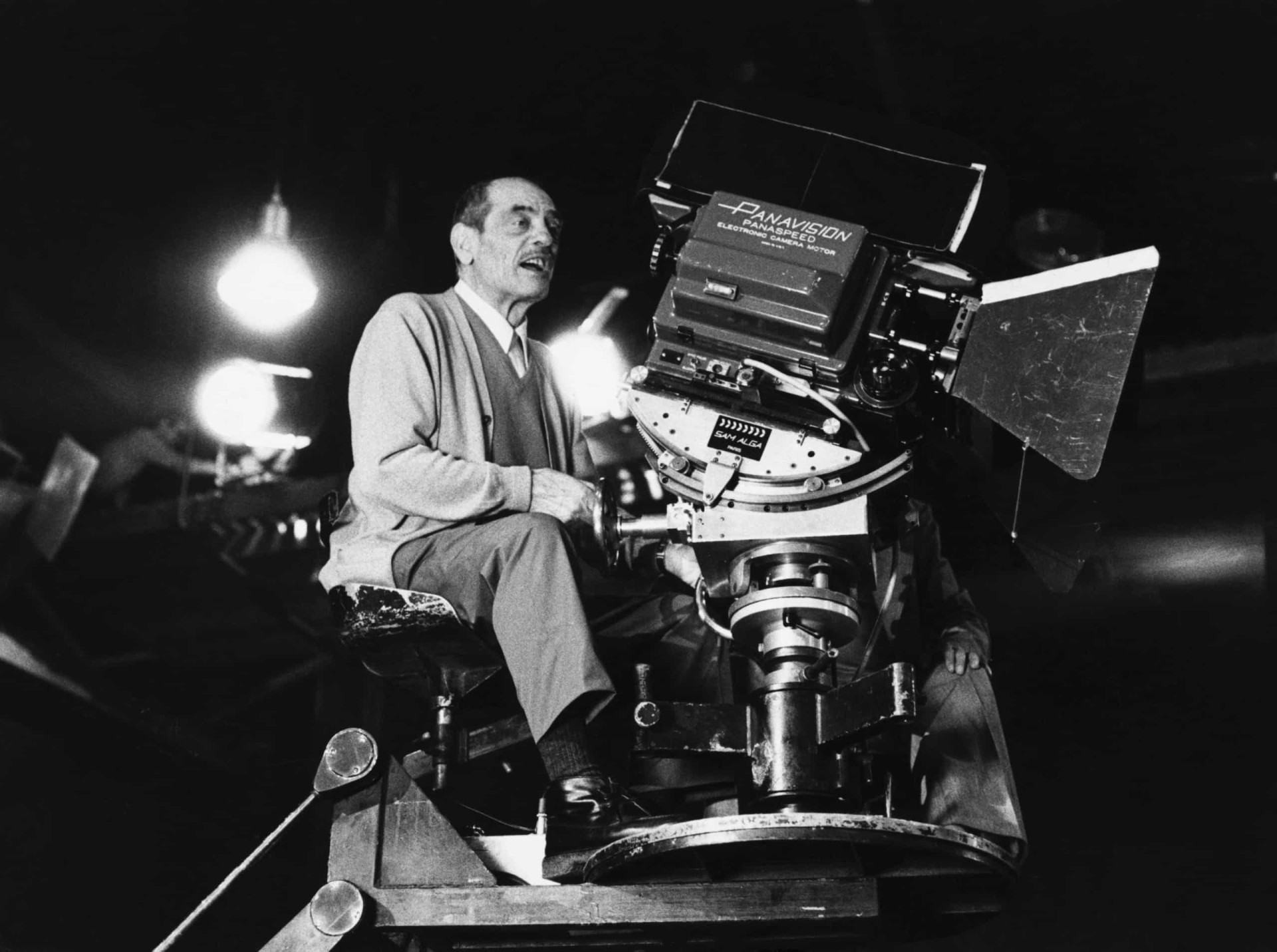Vintage photographs of film directors on set
