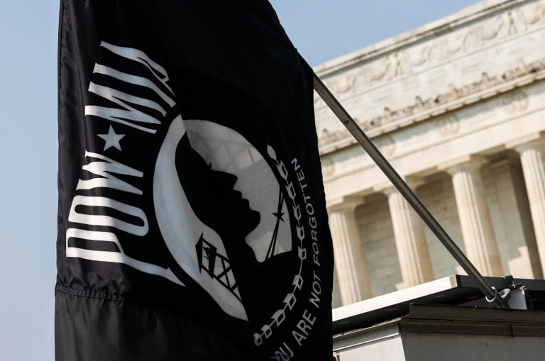 Why are POW/MIA flags flying in Virginia?