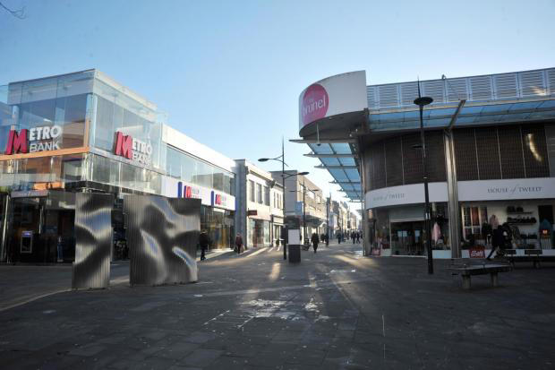 Town centre shop on run-down street announces reason for closure