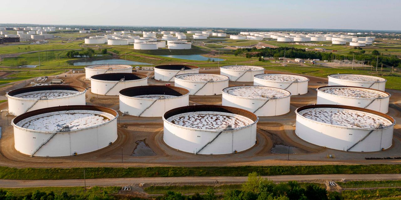 Oil prices end lower as U.S. crude supplies climb for a third week in a row