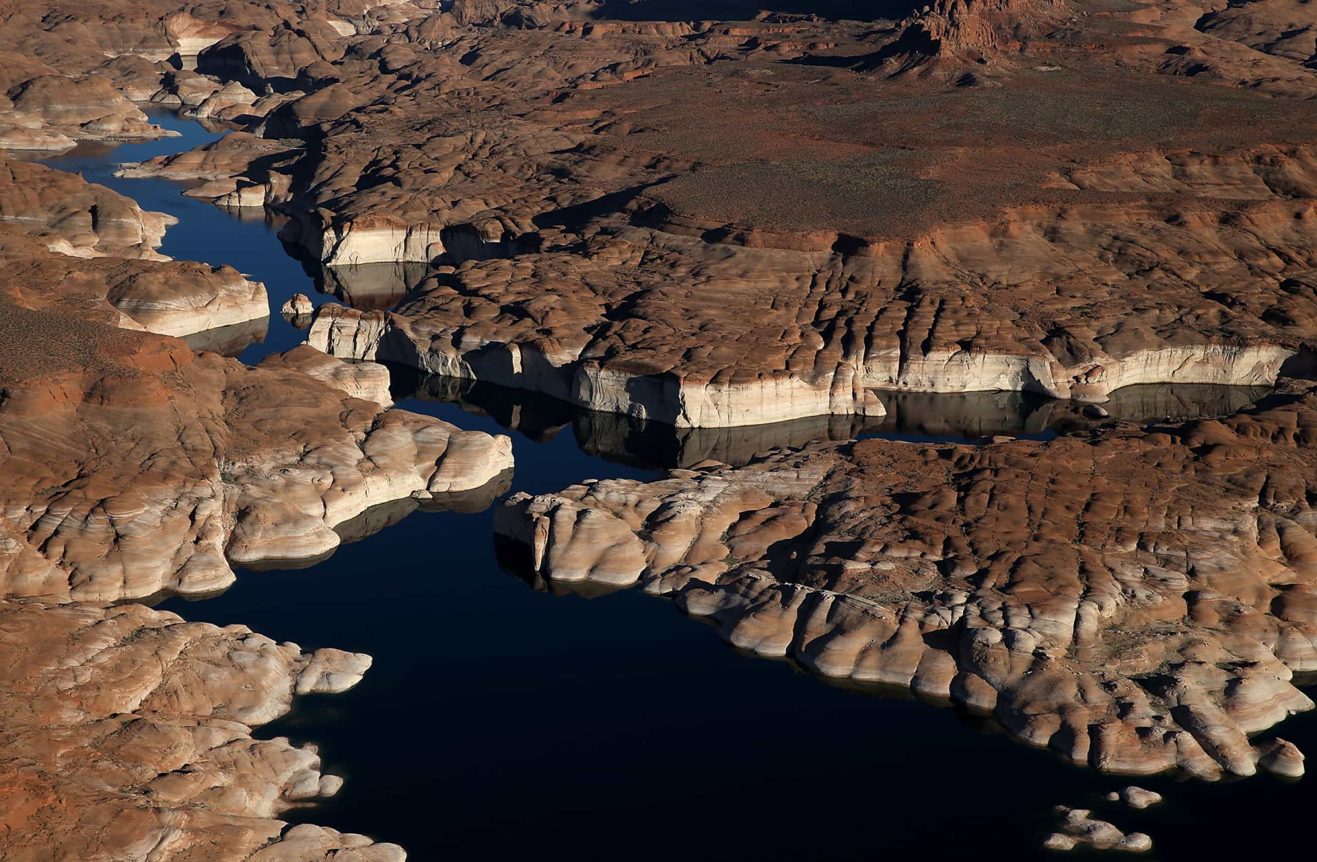 What secrets are revealed by the receding waters of Lake Mead?