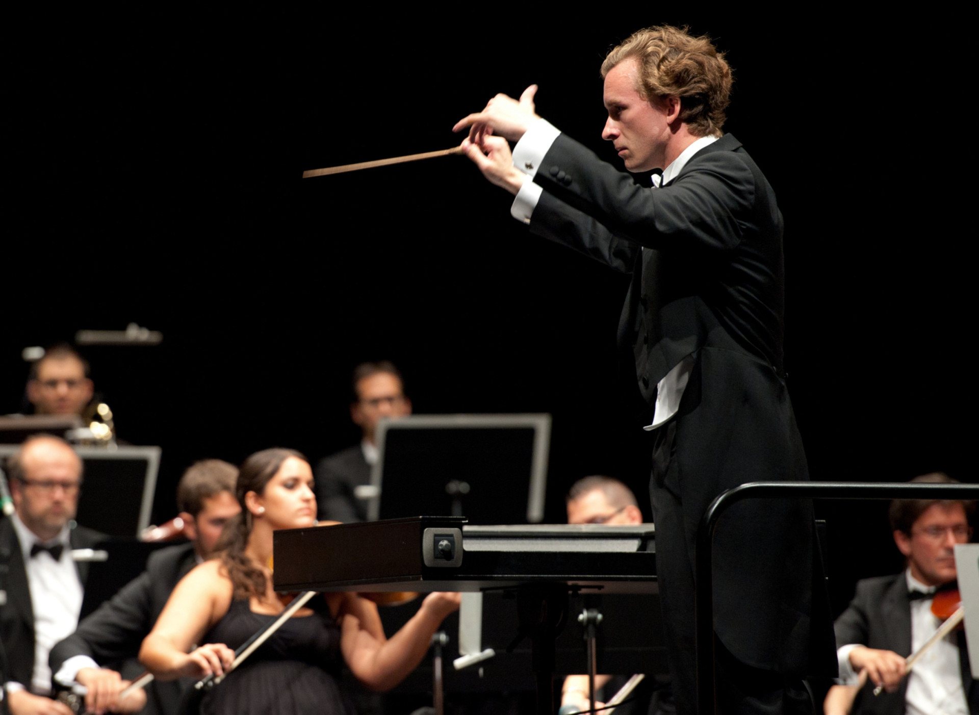 What is the point of a classical music conductor?