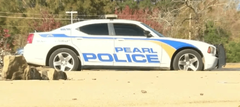 Woman found dead inside vehicle in Pearl