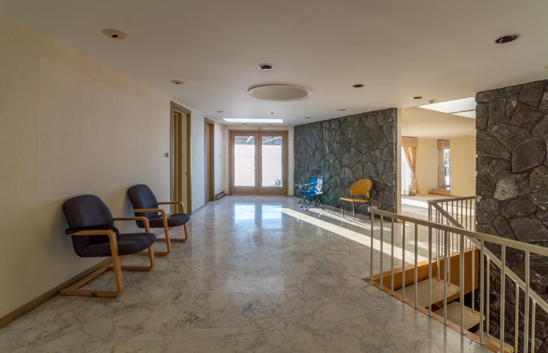 See inside this mysterious abandoned mansion with a secret red room