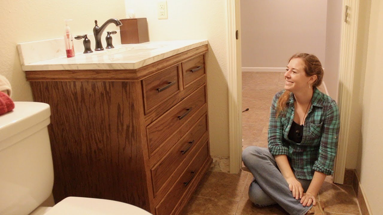 Finish a bathroom vanity with drawers