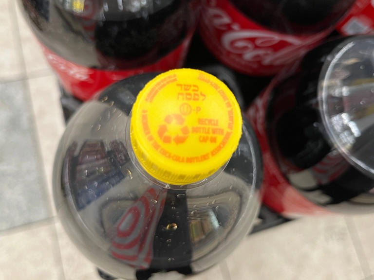 Here's why Coca-Cola bottles have yellow caps right now