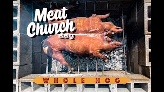 How a Whole Hog Cooks for 14 Hours Over Open Flame
