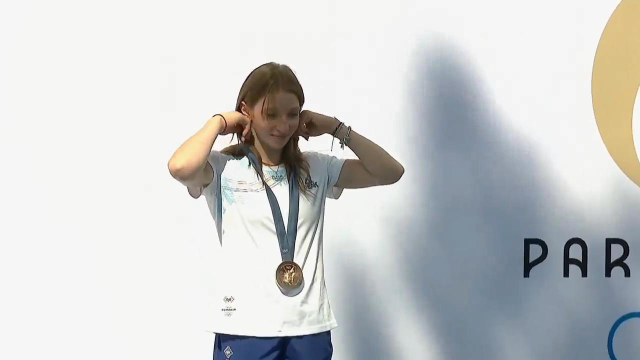 Romanian gymnast receives her Olympic bronze medal at expense of ... Romanian gymnast receives her Olympic bronze medal at expense of ...