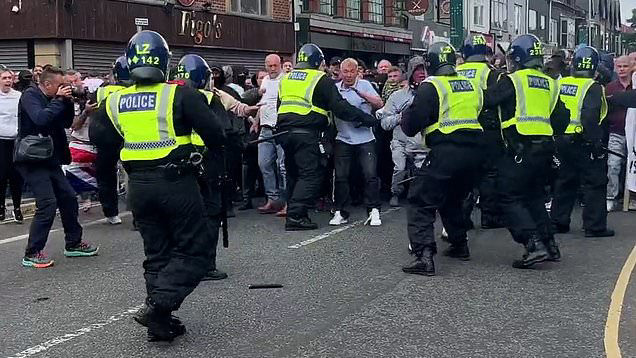 Scuffles break out between police and protesters in Middlesbrough Scuffles break out between police and protesters in Middlesbrough