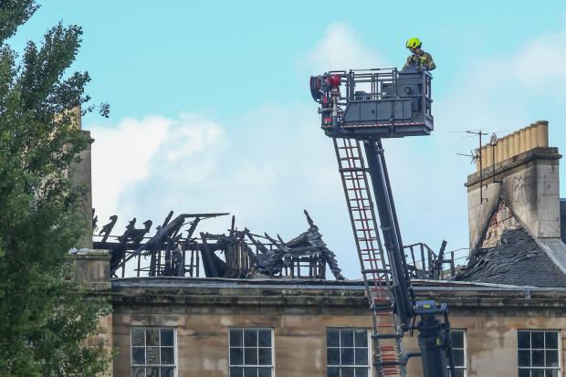 Roof being installed at fire damaged historic former hospice