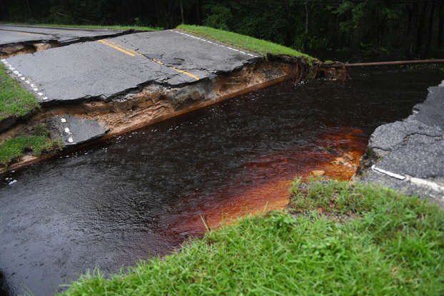 Dramatic photos show destroyed road left in Debby's wake in SC Dramatic photos show destroyed road left in Debby's wake in SC