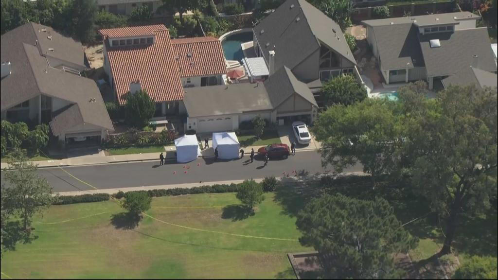 Police shoot suspect accused of attacking a woman outside an Irvine home Police shoot suspect accused of attacking a woman outside an Irvine home
