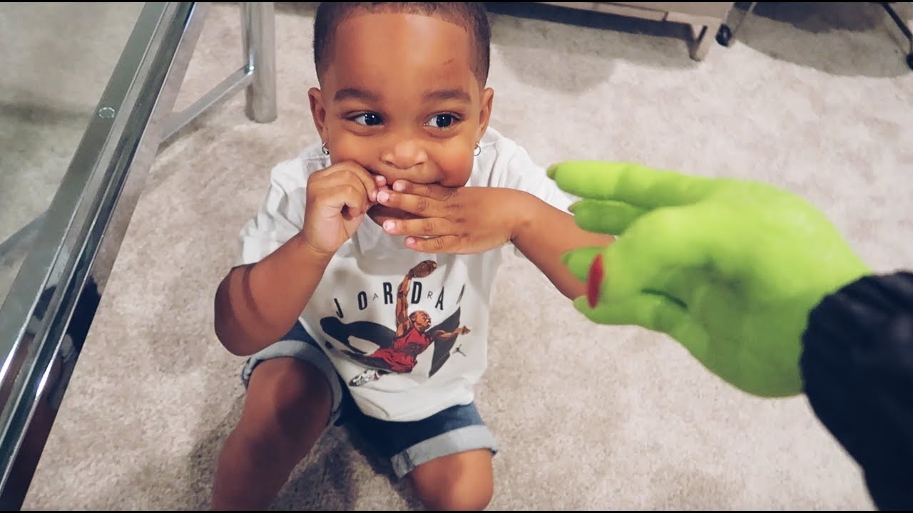 Who Is the Mysterious Green Hand Man?