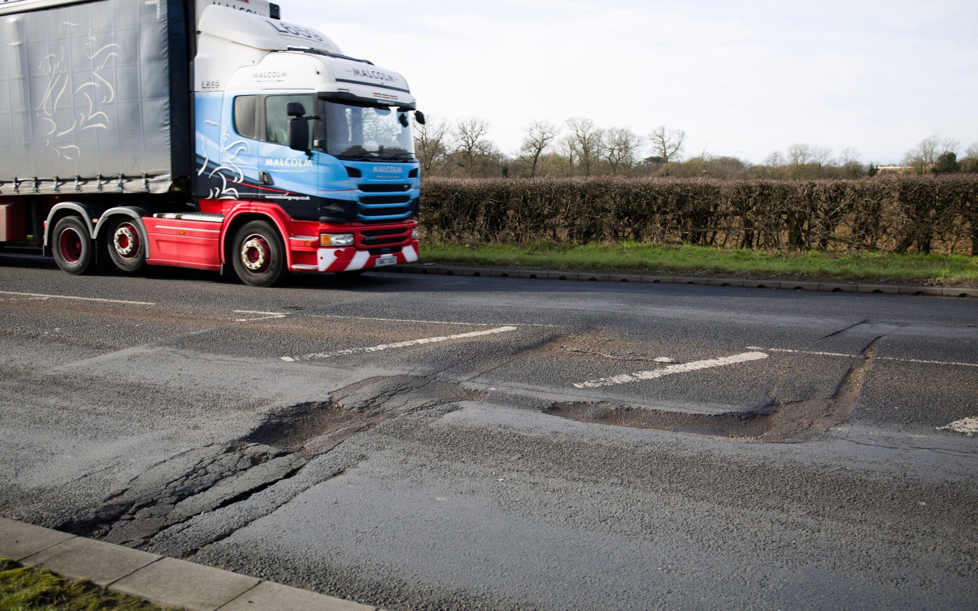 Britain’s pothole-ridden roads so bad ‘they are damaging the economy’ Britain’s pothole-ridden roads so bad ‘they are damaging the economy’