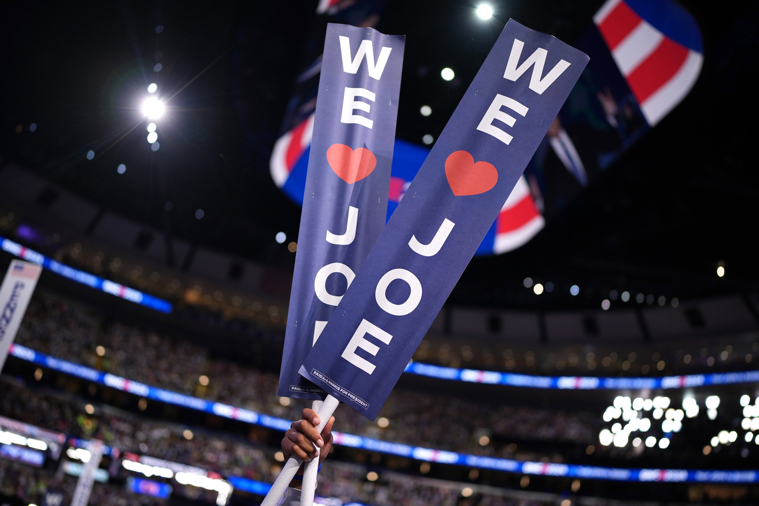 Israel Protester Hit With 'We Love Joe' Sign During Biden's DNC Speech Israel Protester Hit With 'We Love Joe' Sign During Biden's DNC Speech
